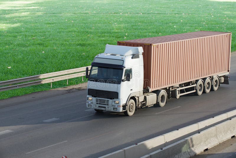 The truck on asphalt road stock photo. Image of logistic - 84567362