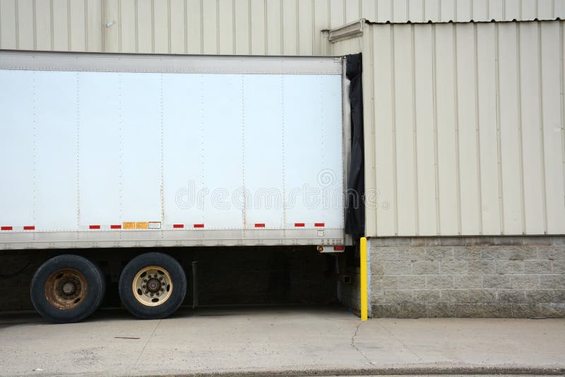 Truck backed into dock stock photo. Image of semi, parked - 52801642