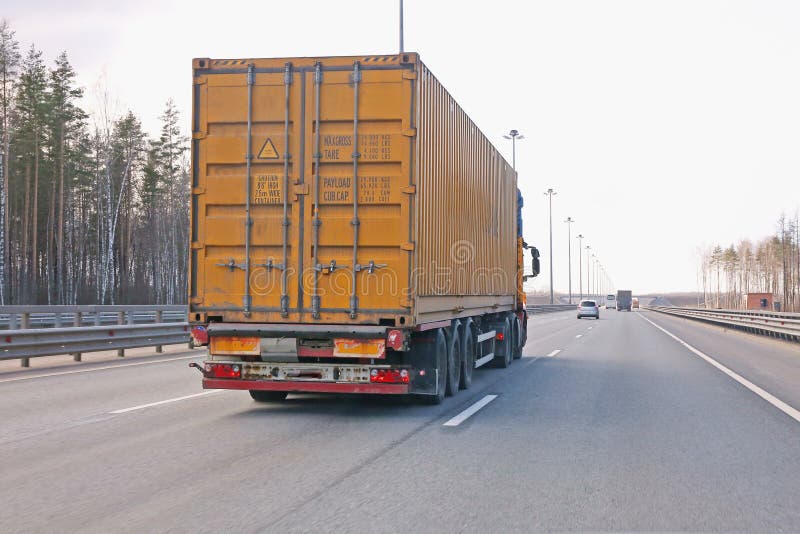 Truck Carries a Heavy Container Stock Photo - Image of container ...