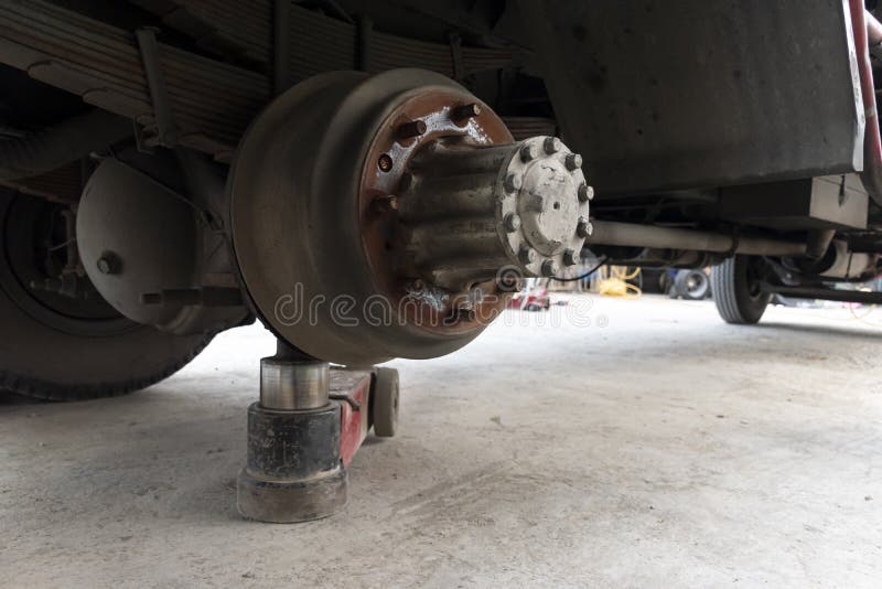 Truck Change Wheels Using a Lifting Jack Stock Photo - Image of holding ...