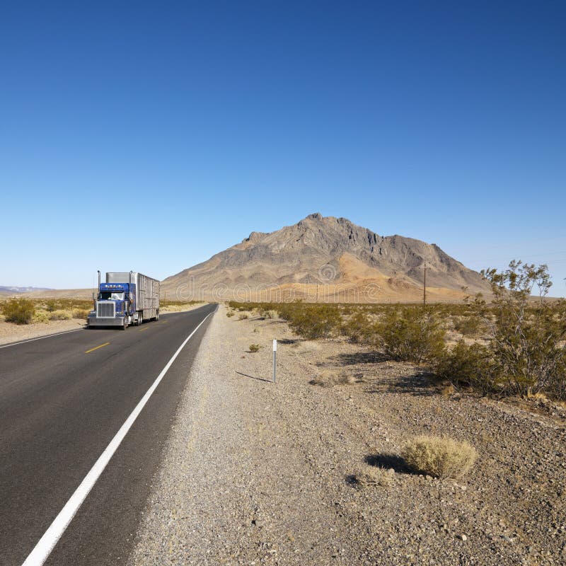 Semi-truck on the Road in the Desert Stock Image - Image of ...