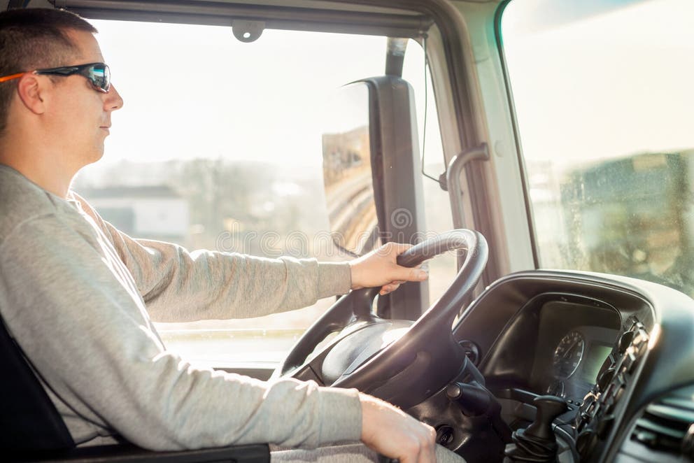 Truck driver in the cab stock image. Image of male, manual - 53673151