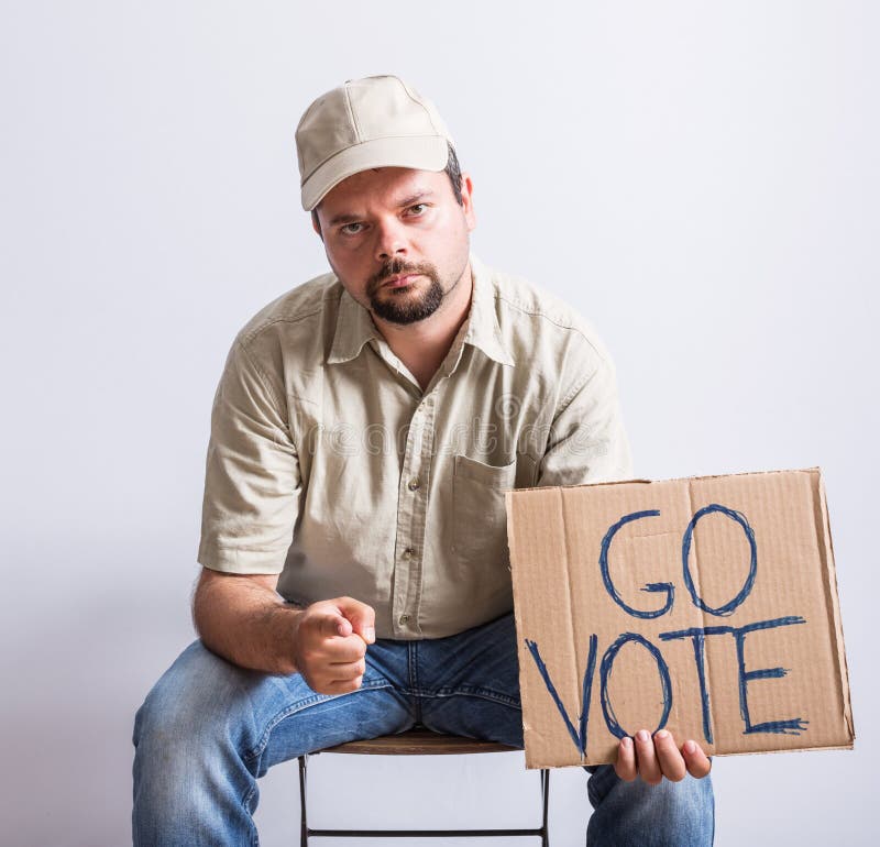Truck Driver Holding Go Vote Sign Stock Photo - Image of election, sign ...