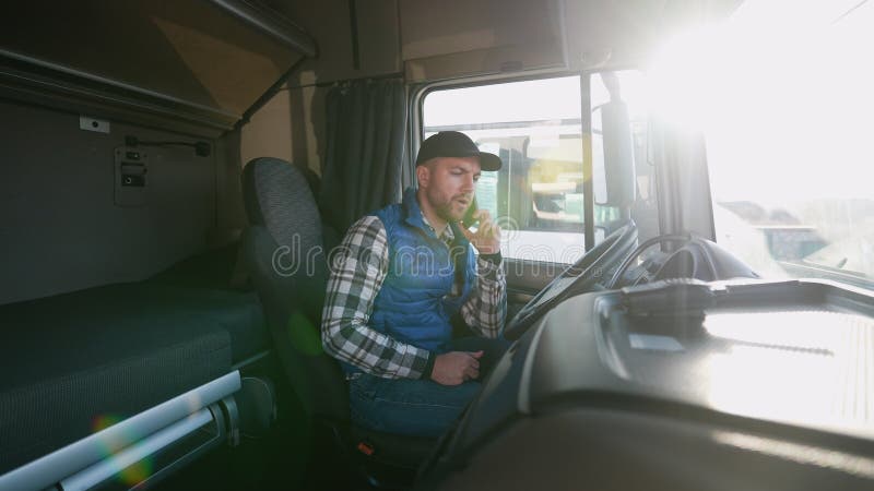 Truck Driver Making a Phone Call Inside the Cabin Stock Footage - Video ...