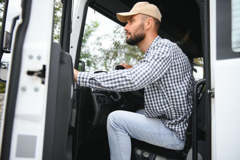 Truck Driver Sitting in Cab Stock Image - Image of hair, cargo: 296521561