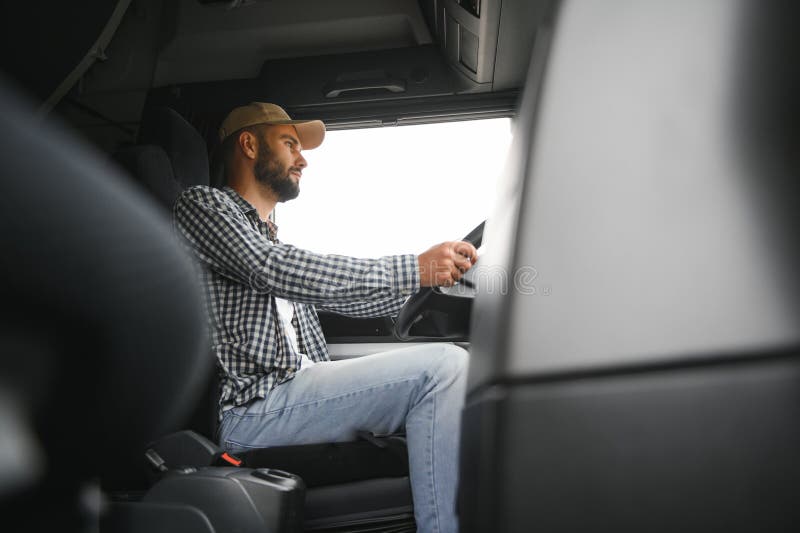 Truck Driver Sitting in Cab Stock Photo - Image of angle, stop: 296521616