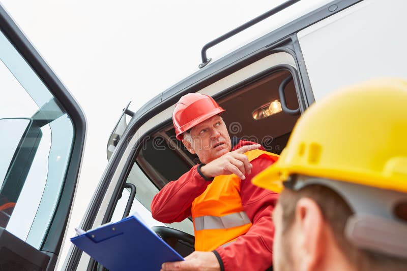 Truck Drivers from the Haulage Company and Construction Workers Stock ...