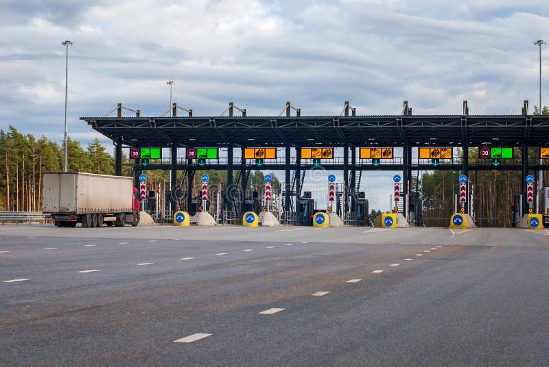 Truck Drives through Exit Gate at Toll Road Editorial Stock Photo ...