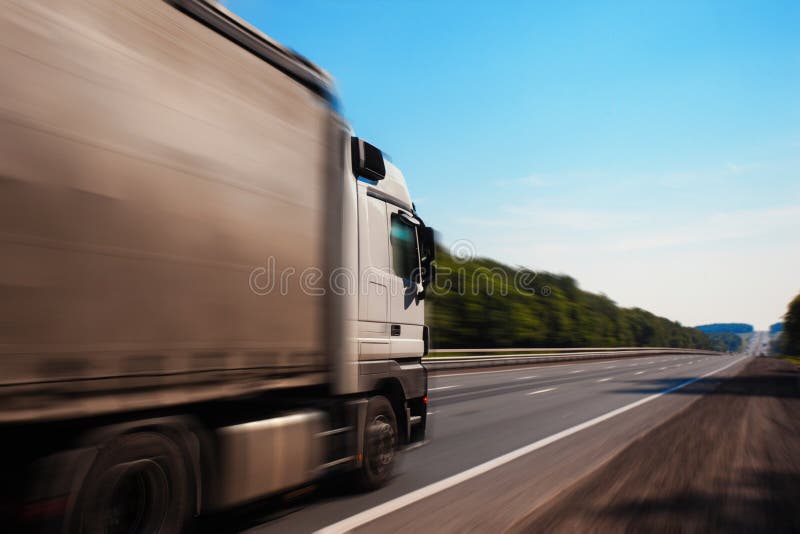A Truck is Driving Down the Road Stock Image - Image of freight ...