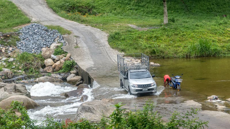 Truck Driving through River in Kiriwong Thailand Stock Photo - Image of ...