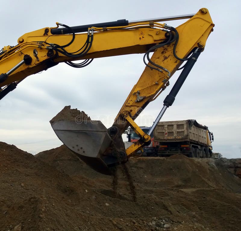 Truck and excavator stock photo. Image of machine, gravel - 113447884