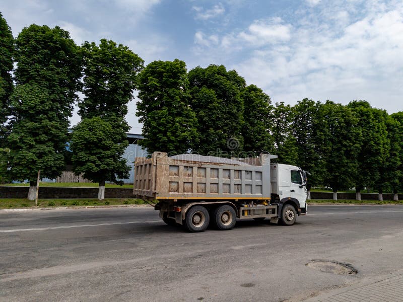 The Truck Filled with a Load Rides Along the Road Stock Image - Image ...