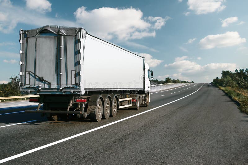 The Truck is Going Up the Road. Cargo Transportation Concept Stock ...