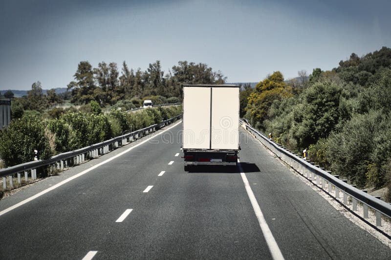 Truck on a Highway - Back View Stock Image - Image of wheeler, asphalt ...