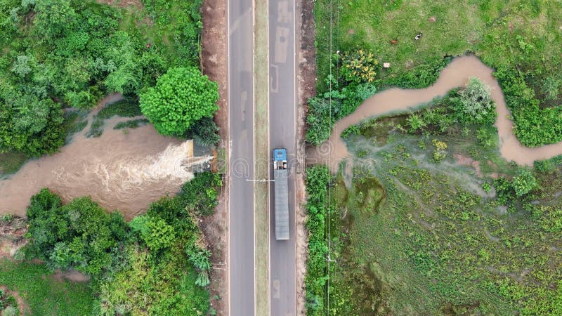 Truck on Highway Passing Bridge Stock Image - Image of drone, view ...