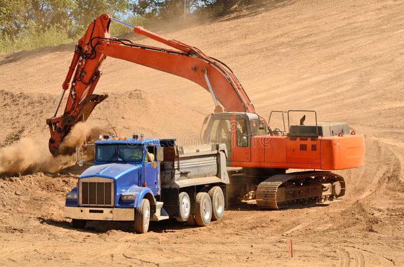 Backhoe Loader Loading Truck Stock Image - Image of track, earthmover ...
