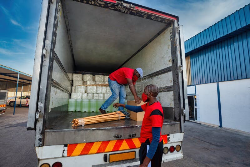 Truck loading stock photo. Image of corona, person, outside - 187201650