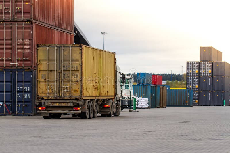 Truck while Loading in Logistic Shipping Yard with Cargo Container ...