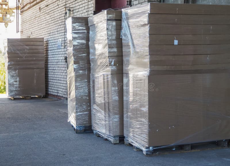 Truck Loading and Shipping. Stack of Carton Boxes on Pallet Ready for ...