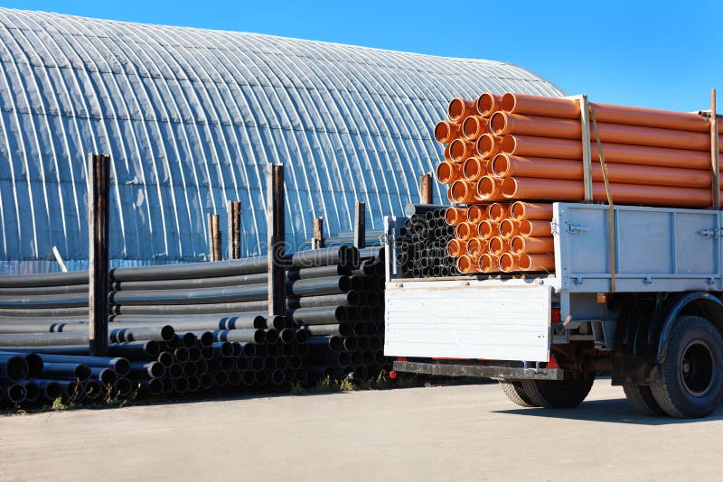 Truck Loads Stacks of Black Pvc Plastic Pipe Outdoors Outside the ...