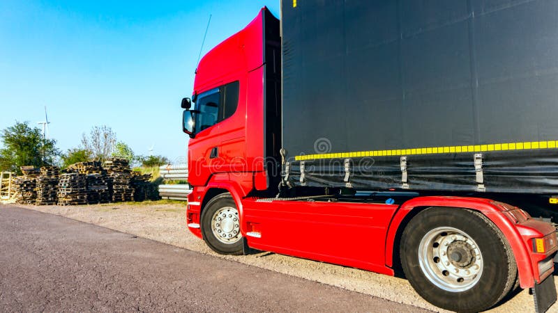 Truck Logistics Building . the Red Truck on the Road Stock Photo ...