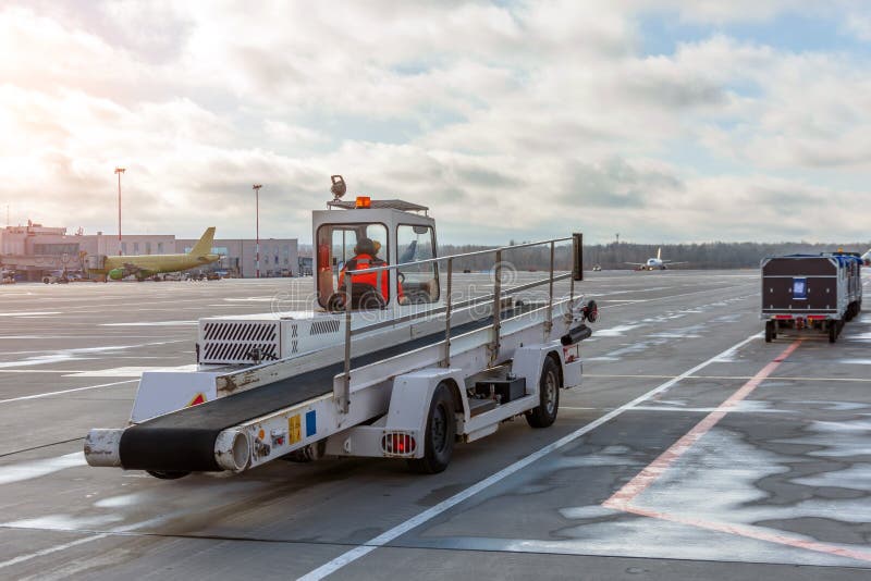 Car for Loading Luggage Compartment of the Aircraft is Ready, Waiting ...