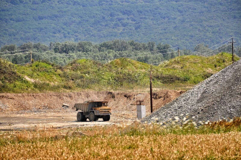 Monster Dump Truck in Open Pit Mine Stock Photo - Image of large, dump ...