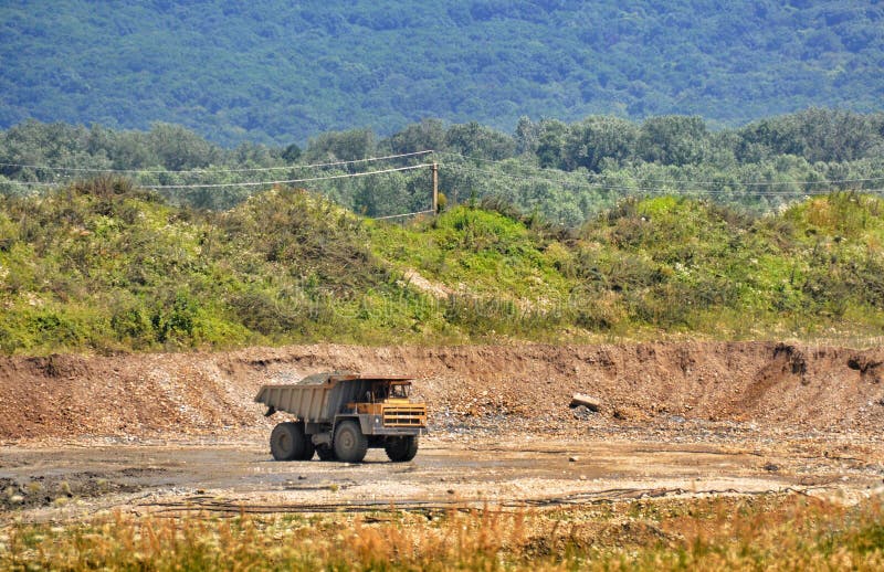 Truck in open pit editorial photo. Image of build, cast - 56893326