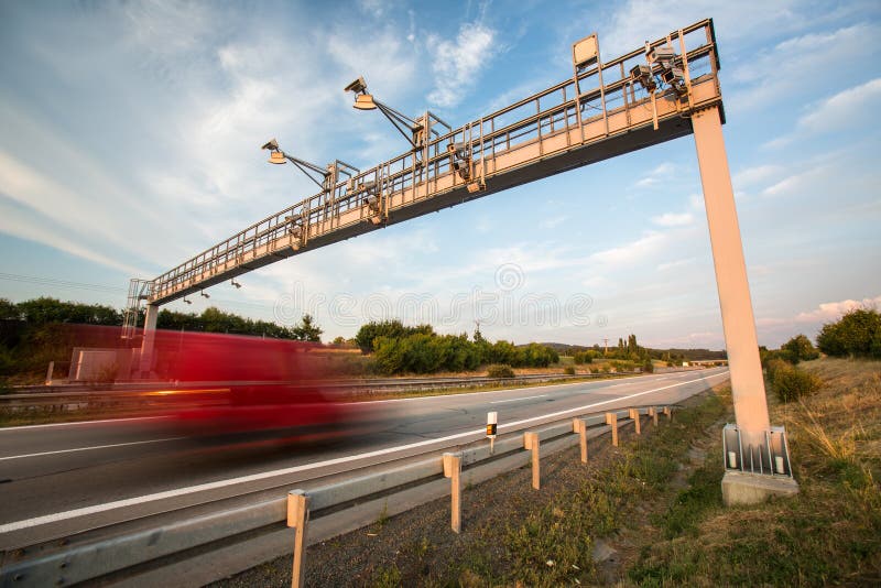 Truck Passing through a Toll Gate on a Highway Stock Photo - Image of ...
