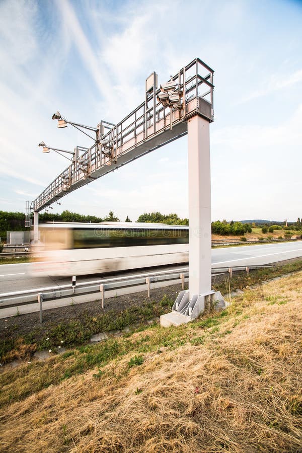 Truck Passing through a Toll Gate on a Highway Stock Image - Image of ...