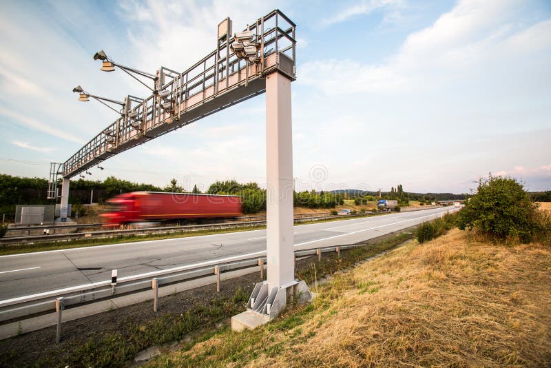 Truck Passing through a Toll Gate on a Highway Stock Photo - Image of ...