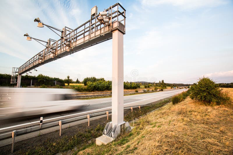 Truck Passing through a Toll Gate on a Highway Stock Photo - Image of ...