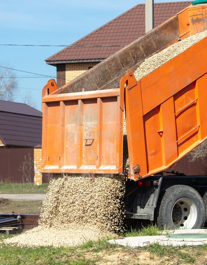 Truck Pours Rubble on the Ground. Stock Image - Image of construction ...