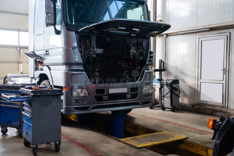 Truck Repair Service Indoors. Maintenance Workshop. Stock Image - Image ...
