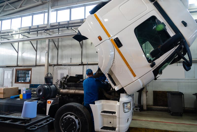 Truck Repair Service Indoors. Maintenance Workshop. Stock Image - Image ...