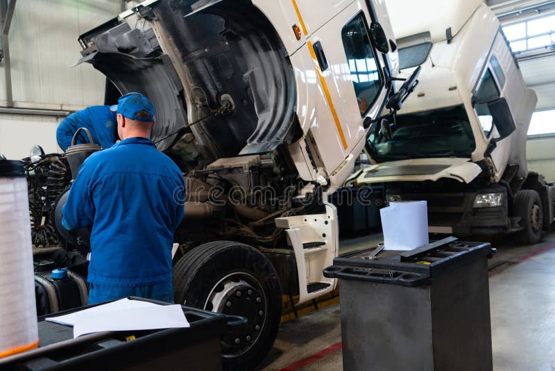 Truck Repair Service Indoors. Maintenance Workshop. Stock Image - Image ...