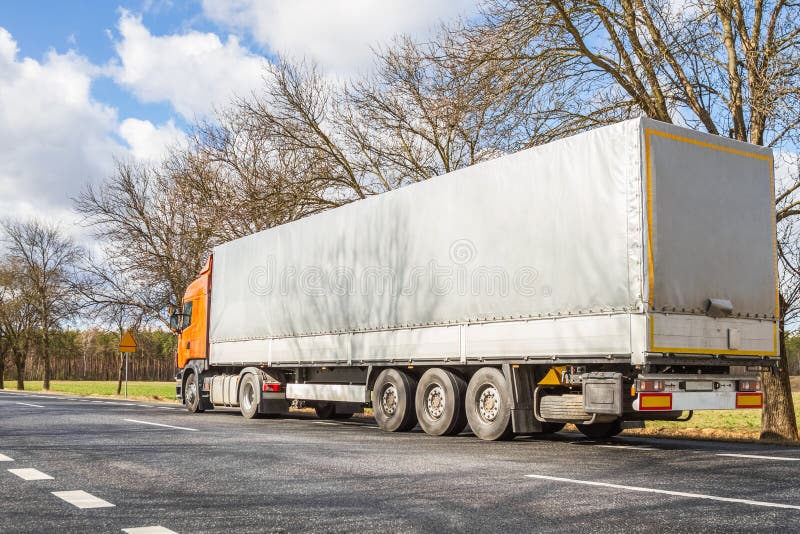 Truck on the road stock photo. Image of thoroughfare - 42354062