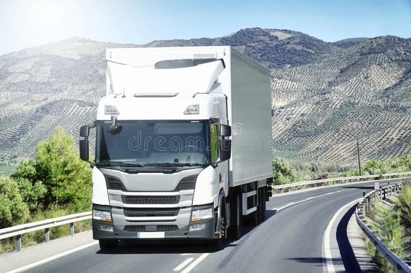 Truck on a Road - Front View, Mountains on Second Plan Stock Photo ...