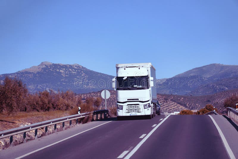 Truck on a Road - Front View, Mountains on Second Plan Stock Image ...