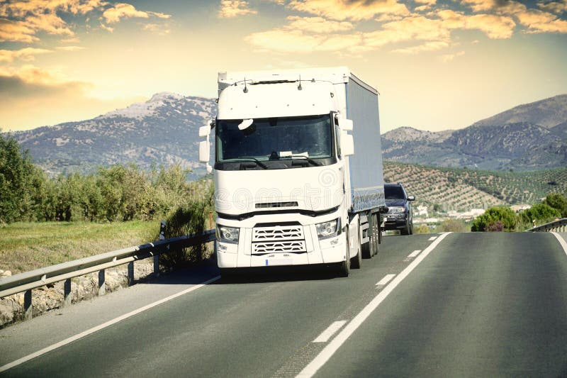 Truck on a Road - Front View, Mountains on Second Plan Stock Photo ...
