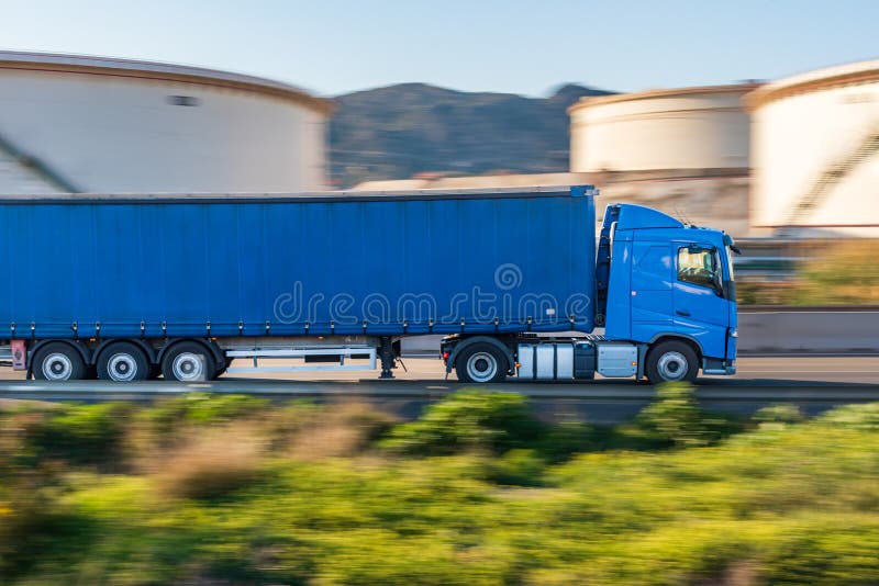 Truck with Sliding Canvas for General Transport Circulating Along a ...