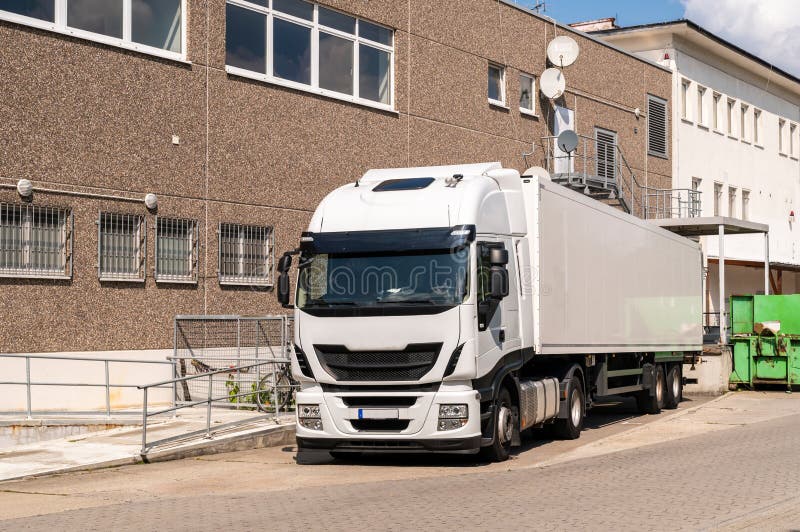 A Truck at a Small Loading Ramp Stock Photo - Image of transportation ...