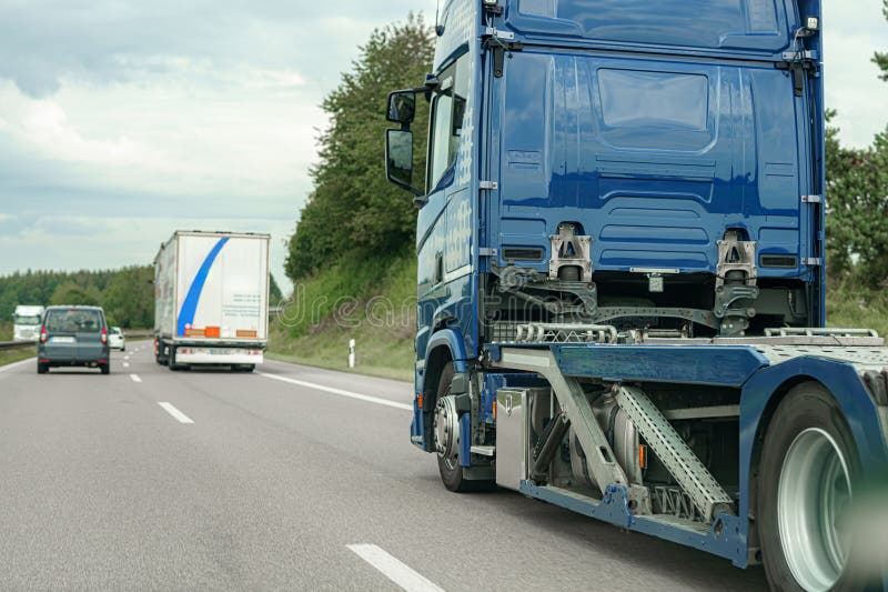 A Truck for Transporting Passenger Cars on the Highway Stock Photo ...