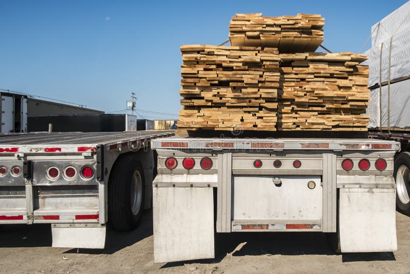 Truck transporting wood stock image. Image of transporting - 74358559