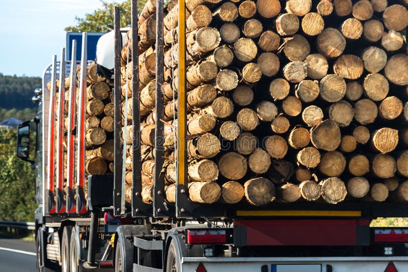 Truck with Tree Trunks on the Highway Stock Image - Image of tree ...