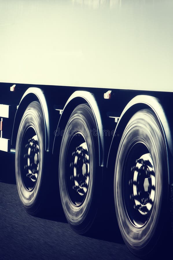 Truck wheels in motion stock image. Image of motion, trailer - 10746953