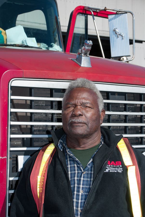 An African American Man Stands in Front of a Mack Truck Editorial Image ...