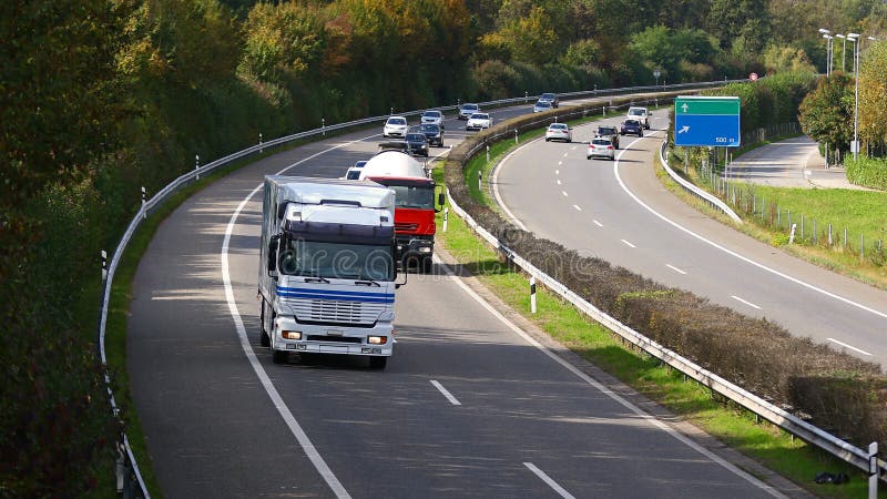 Trucks in freeway traffic stock photo. Image of transport - 79140764