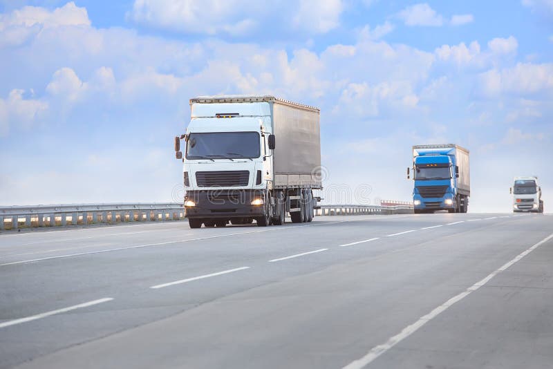 Trucks goes on highway stock image. Image of highway - 100302585