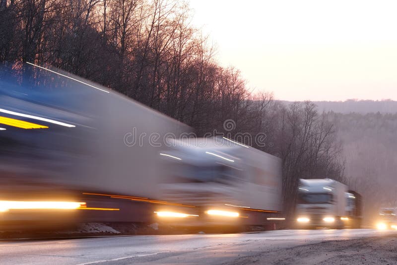 Trucks on a highway stock photo. Image of semi, commercial - 89302996
